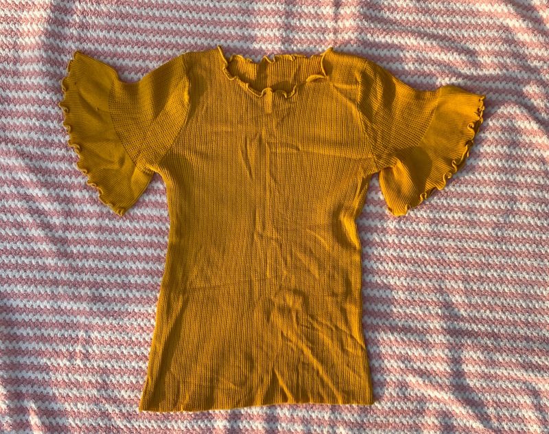 Women > Tops & Tunics | Yellow Stretchable Body Hugging top | Freeup